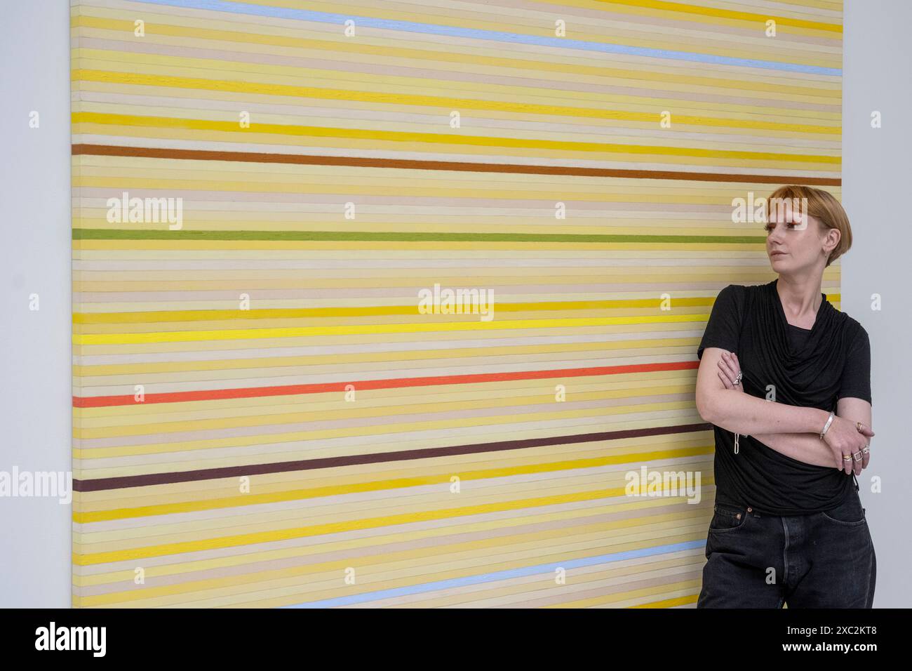 London, UK. 14 June 2024. A staff member with works, 2024, by Fleur ...