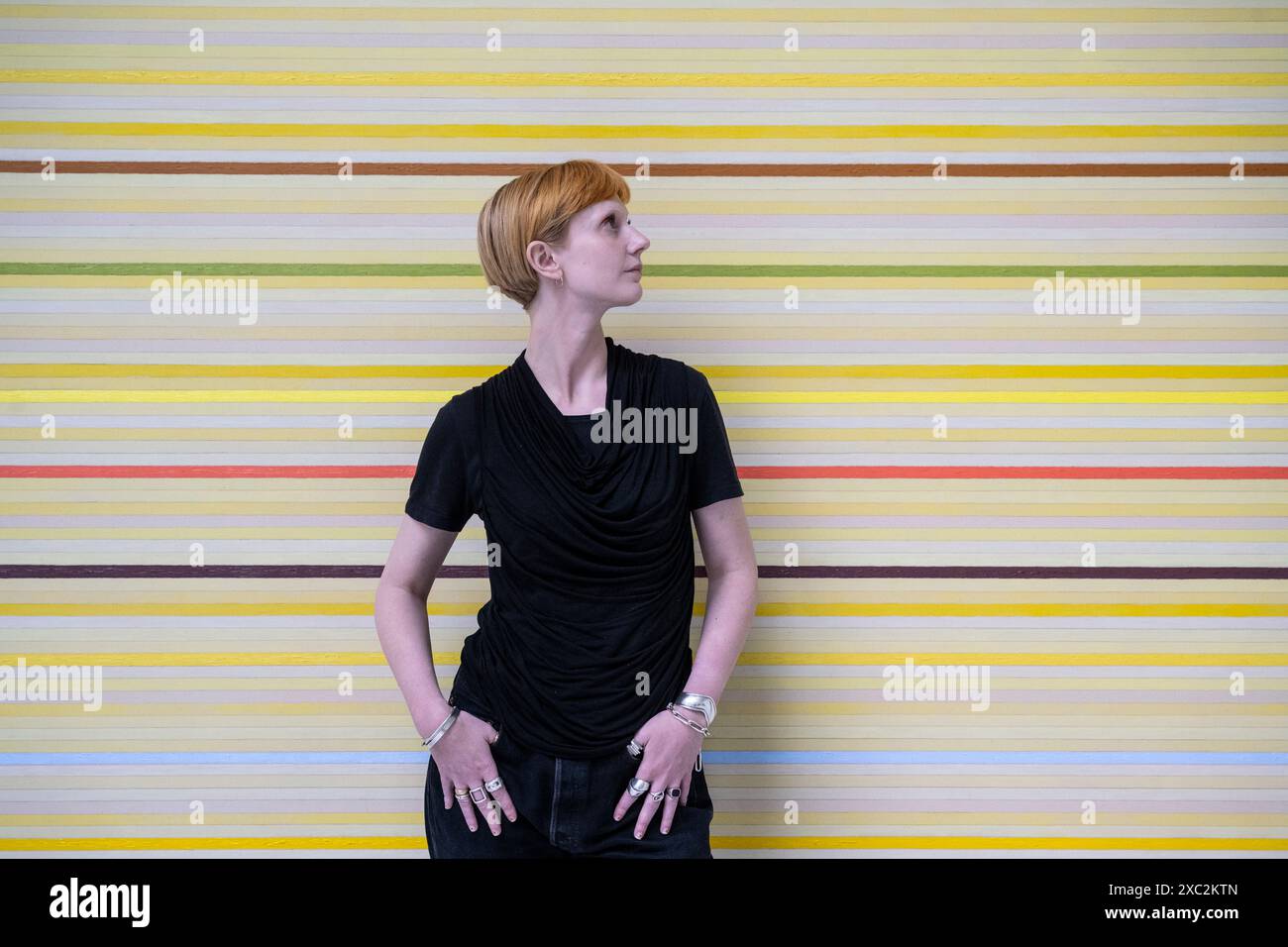 London, UK. 14 June 2024. A staff member with works, 2024, by Fleur ...