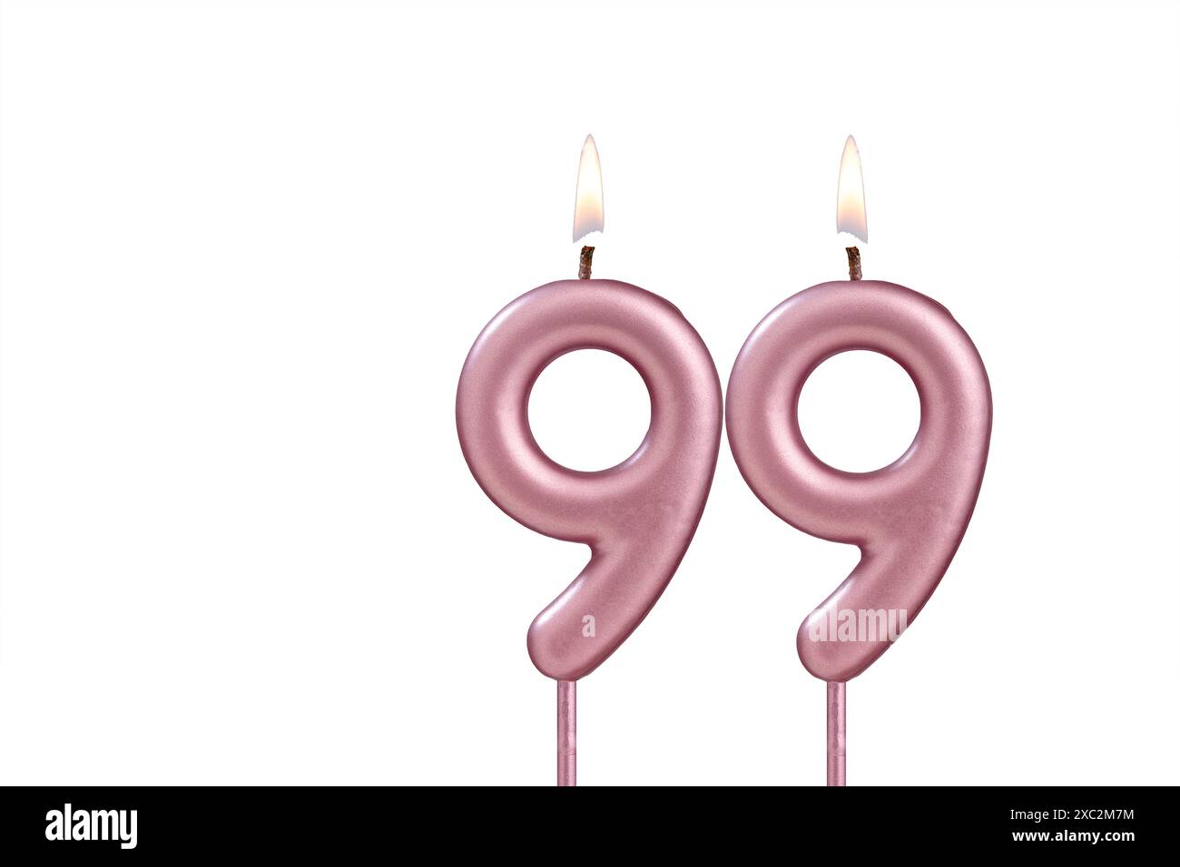 Candle number 99 - Lit birthday candle on white background Stock Photo ...