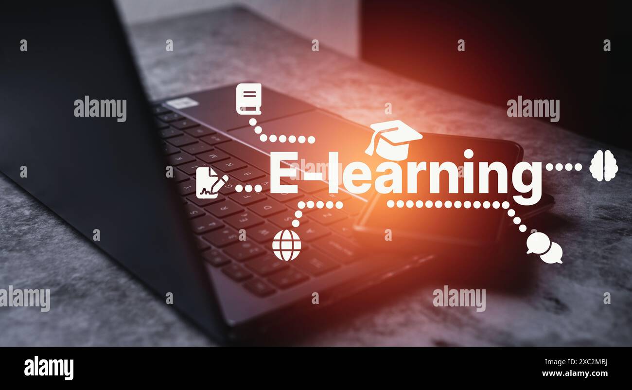 Laptop on desktop with E-learning futuristic interface. Use computer ...