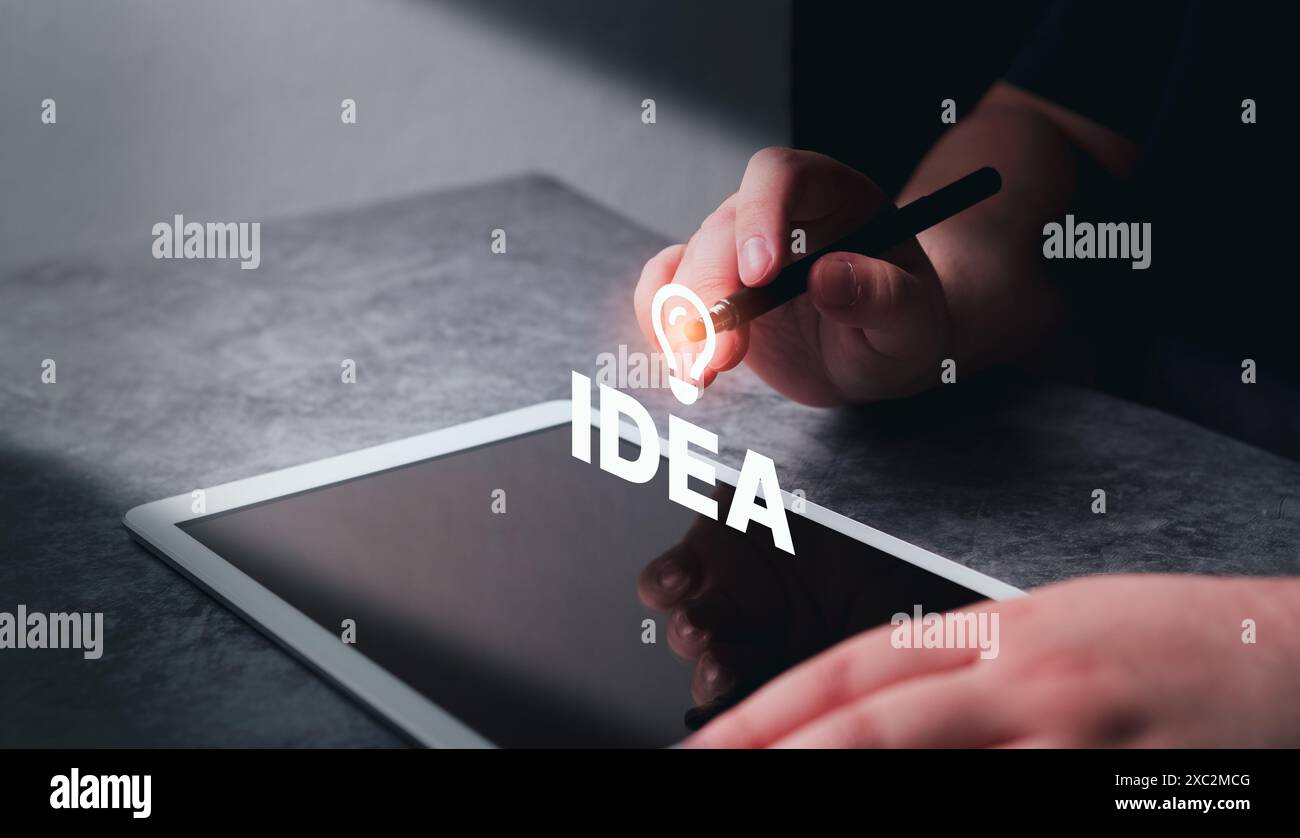Woman use digital tablet with idea holograpic interface. Creative idea ...