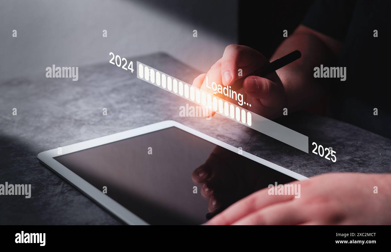 Woman use digital tablet with holographic interface for 2025 new year ...