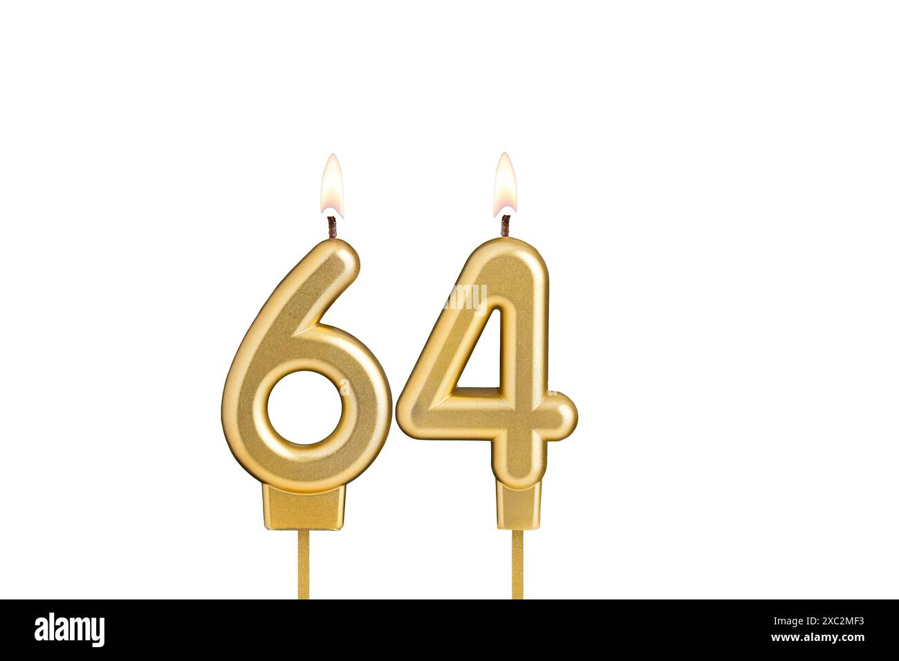 Golden number 64 birthday candle on white background Stock Photo - Alamy