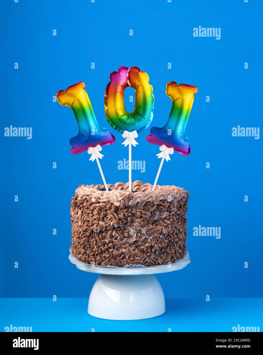 Air balloon number 101 - Birthday cake on blue background Stock Photo ...