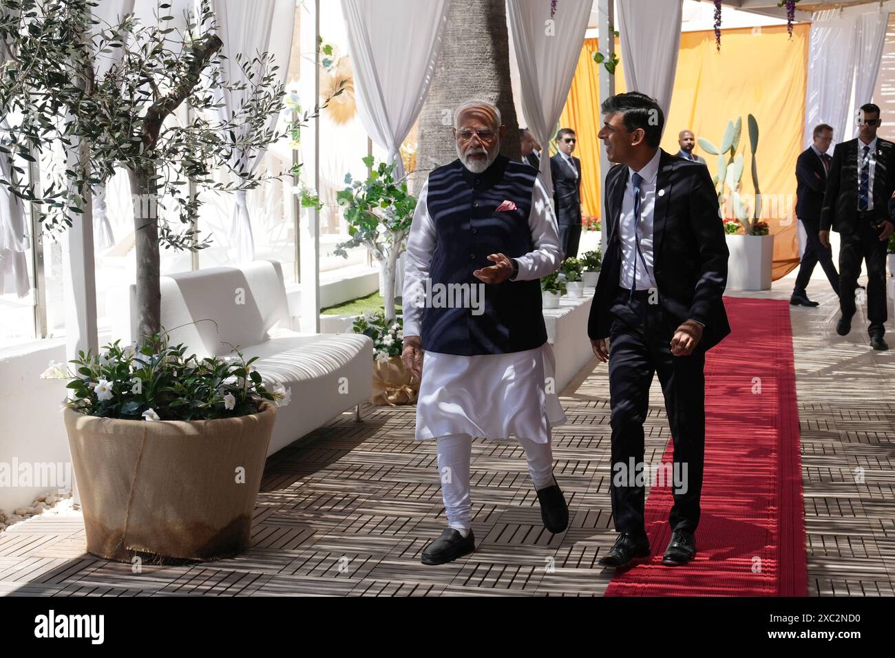 Prime Minister of India Narendra Modi (left) attends a meeting with Prime Minister Rishi Sunak ...