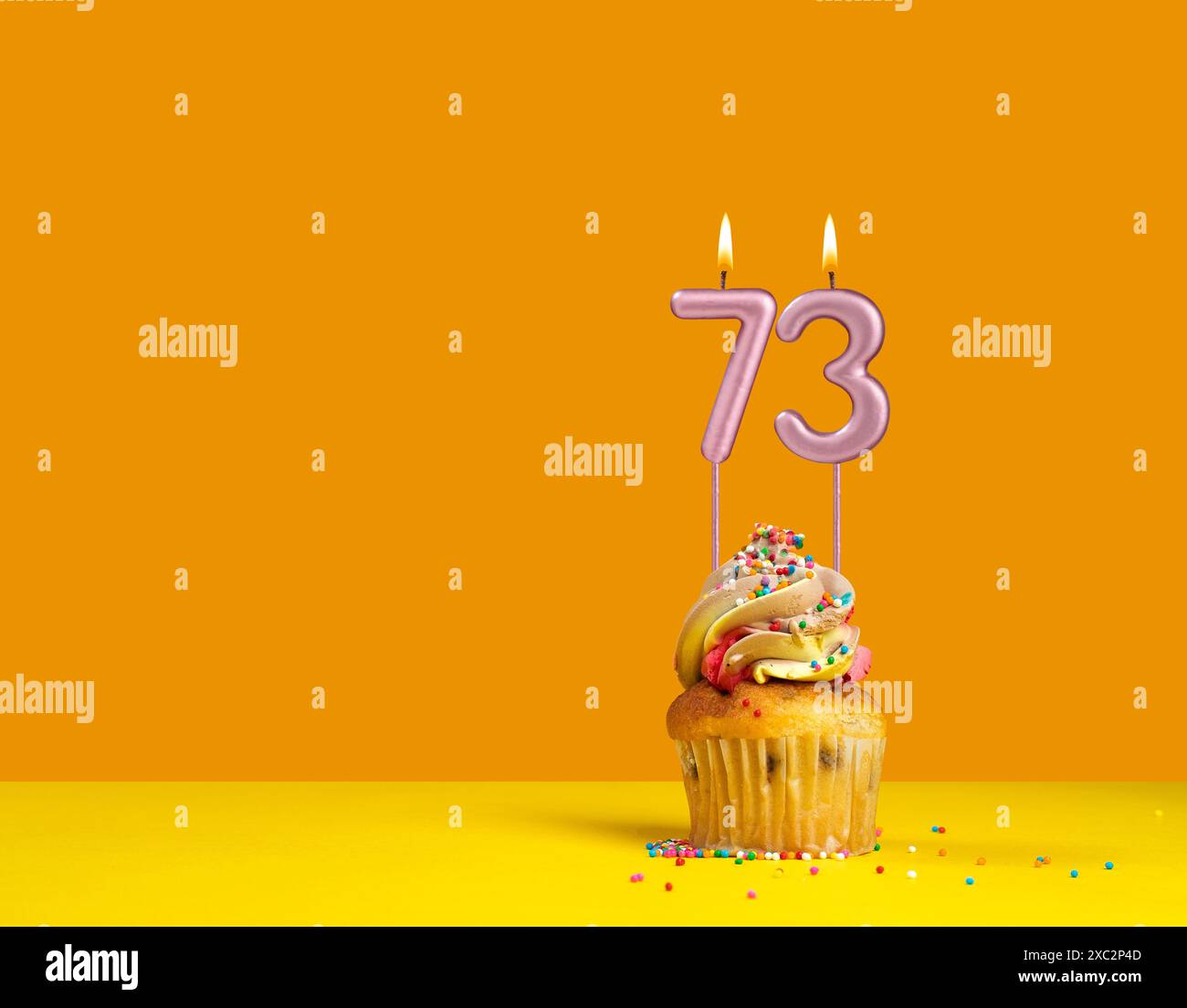 Birthday celebration with cupcake - Candle number 73 Stock Photo - Alamy