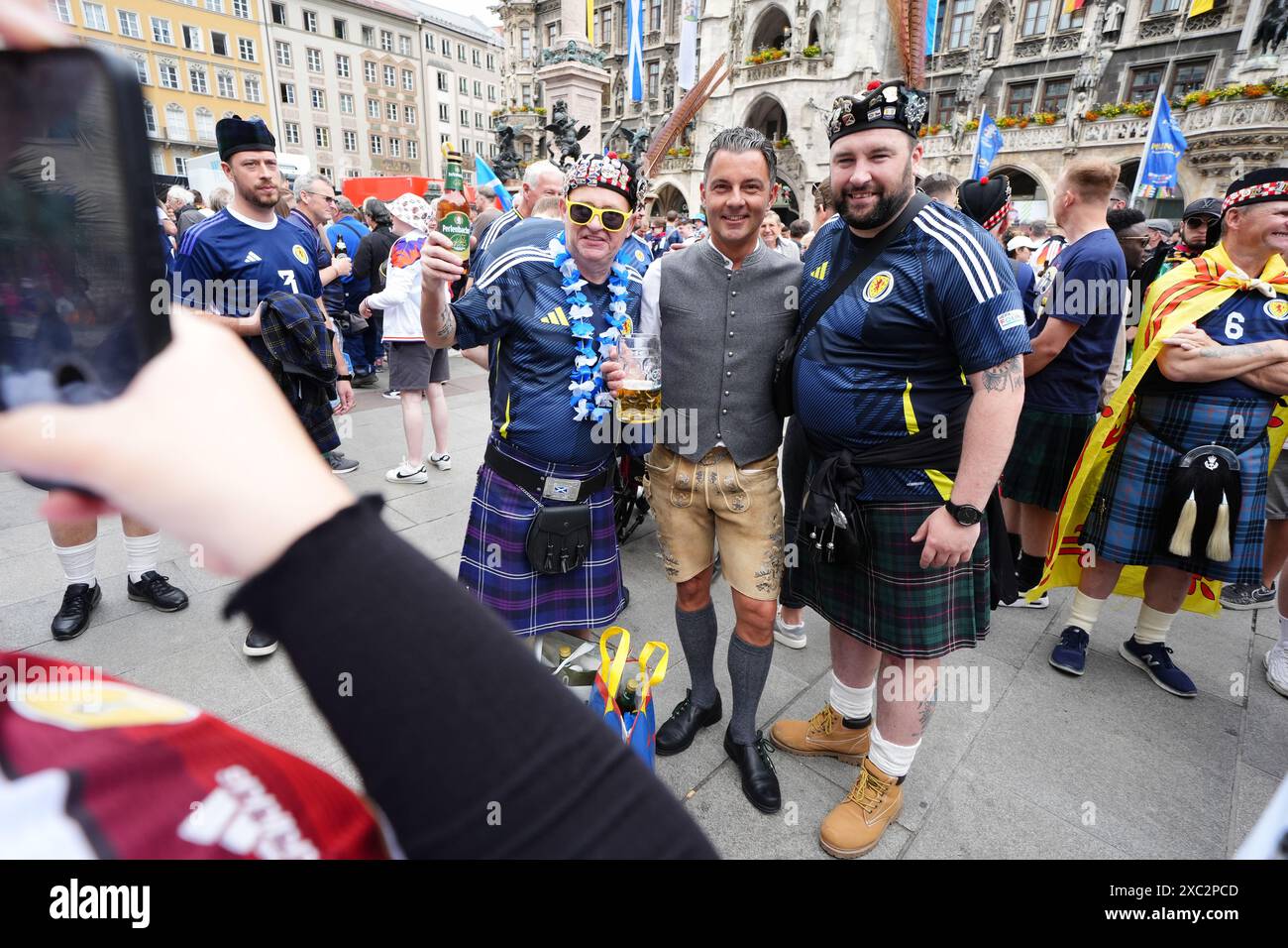 Scotland fans pose for a photo at Marienplatz square, Munich. Scotland ...