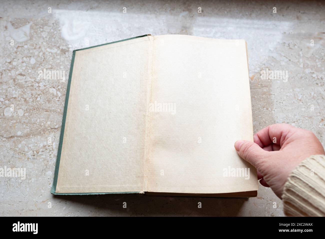 Empty endpaper antique book on marble table, old paper texture, rustic ...