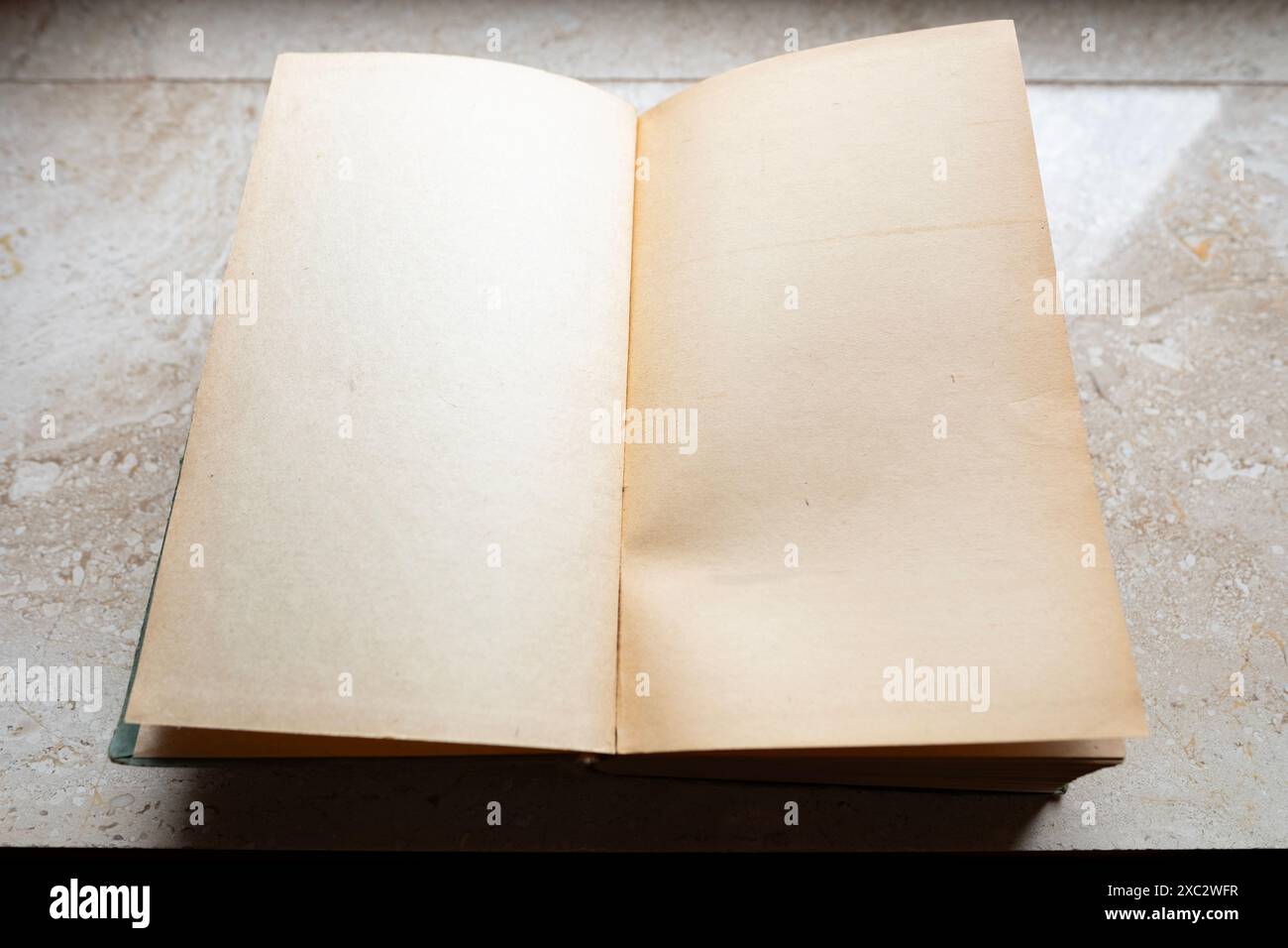 Empty endpaper antique book on marble table, old paper texture, rustic ...