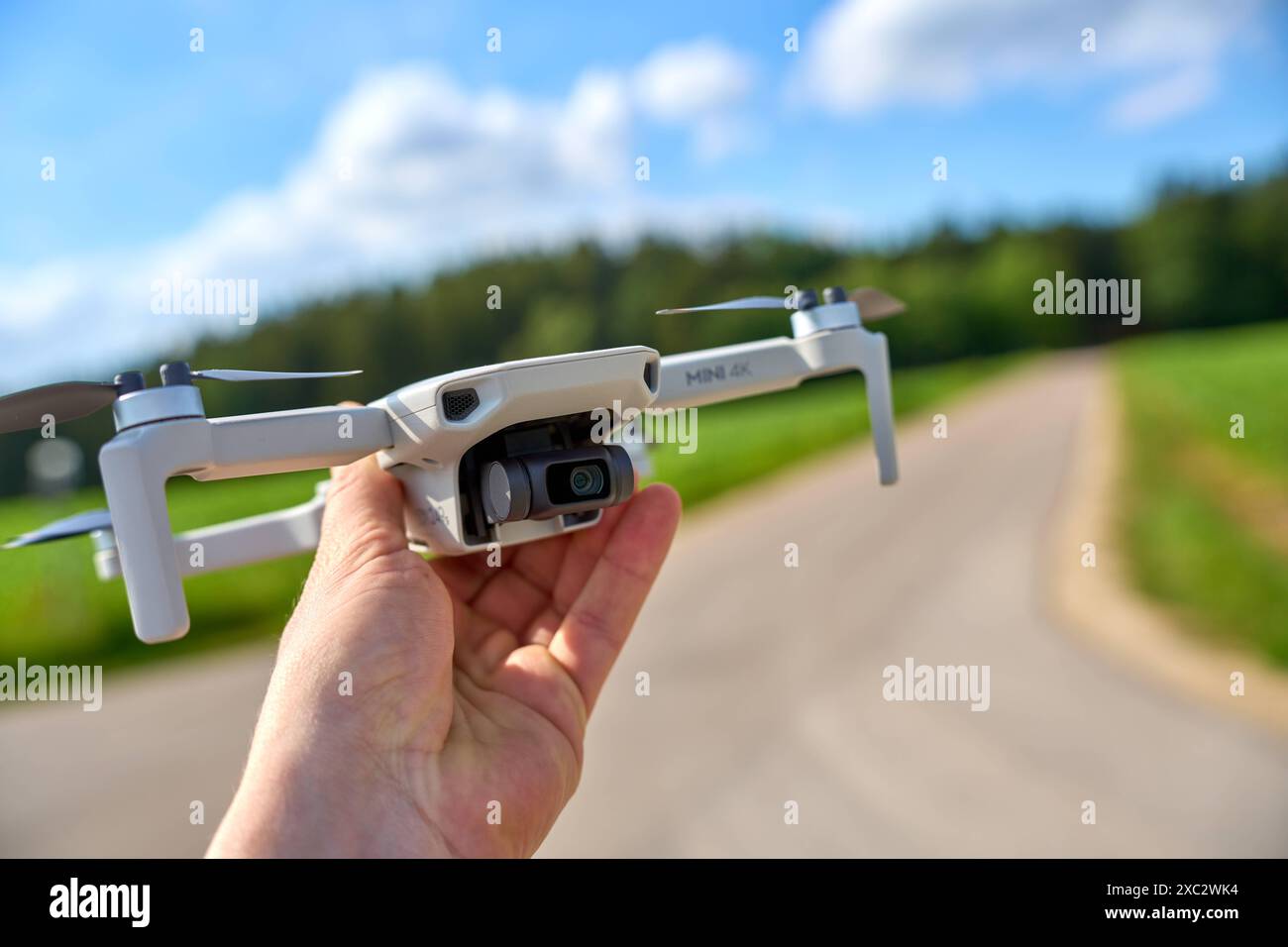 Bavaria, Germany - June 13, 2024: Hand holding a DJI photo and video ...
