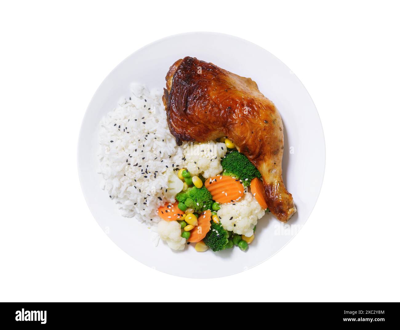 plate of baked chicken leg with vegetables and rice isolated on white ...
