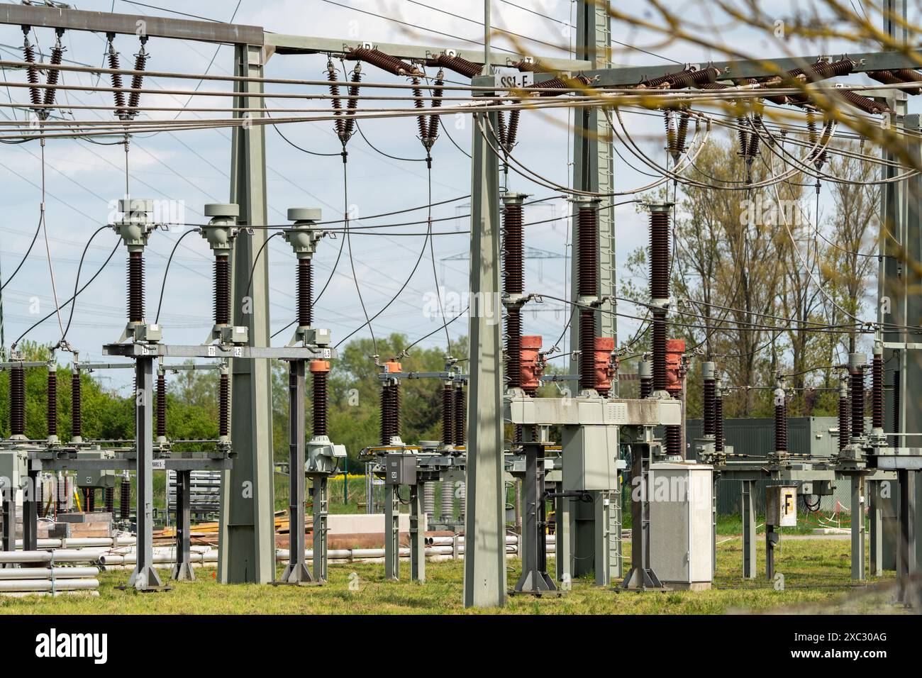 A detailed view of an electrical substation with various components and ...