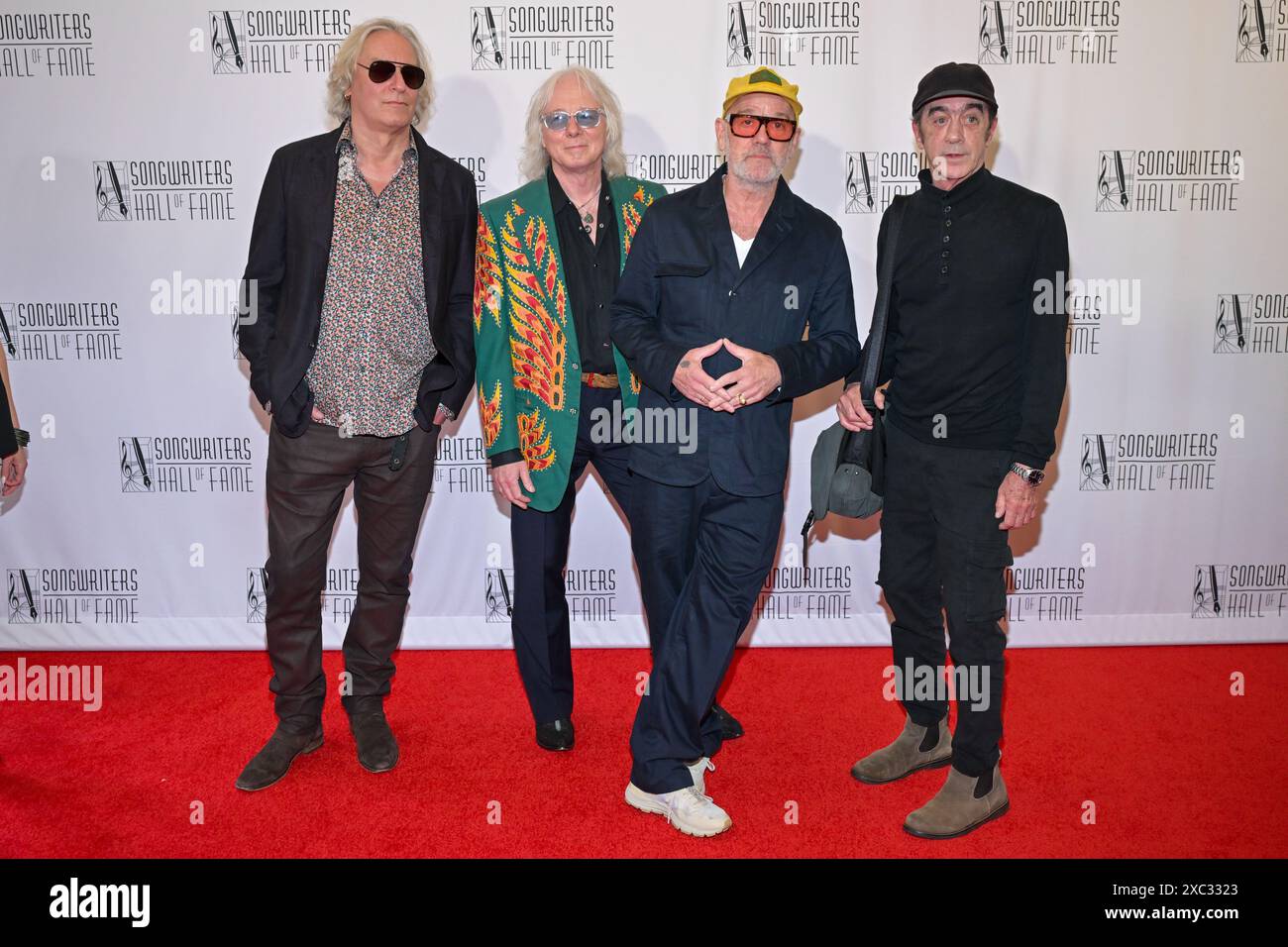 R.E.M. band members Peter Buck, Mike Mills, Michael Stipe and Bill ...