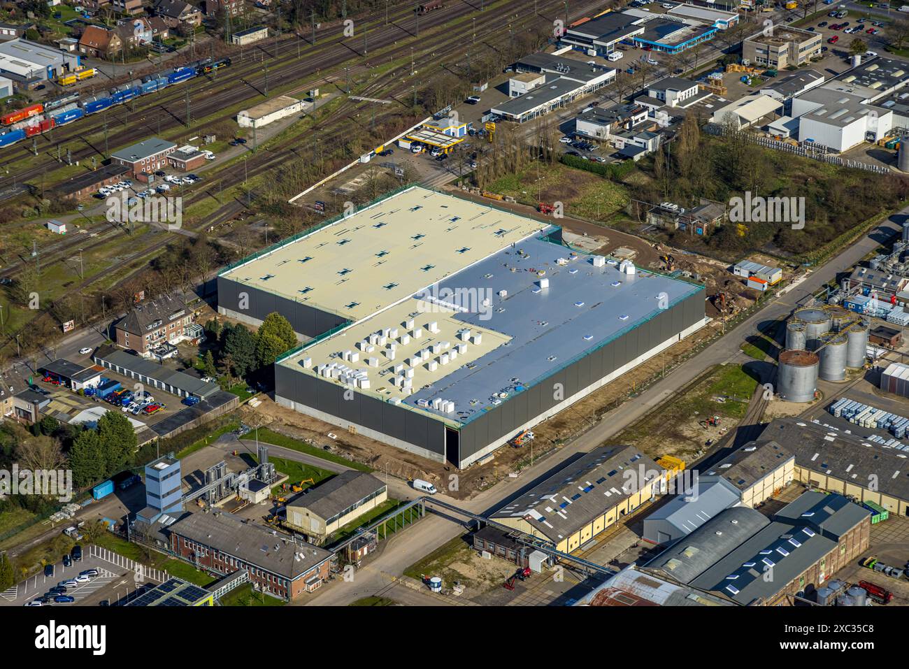 Aerial view, construction site with new hall complex of real estate ...