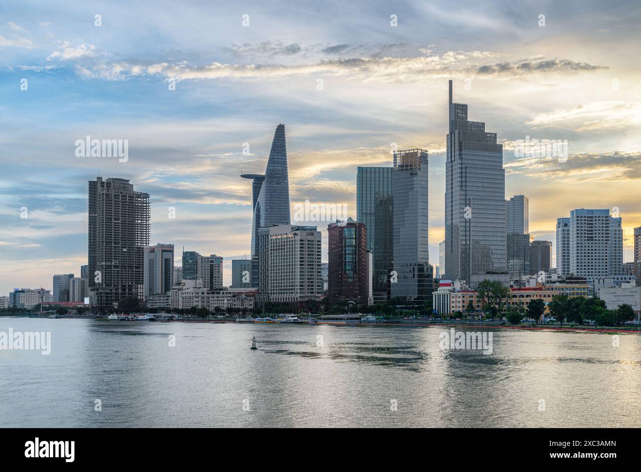 Ho Chi Minh City skyline at sunset. Evening view of skyscrapers and ...