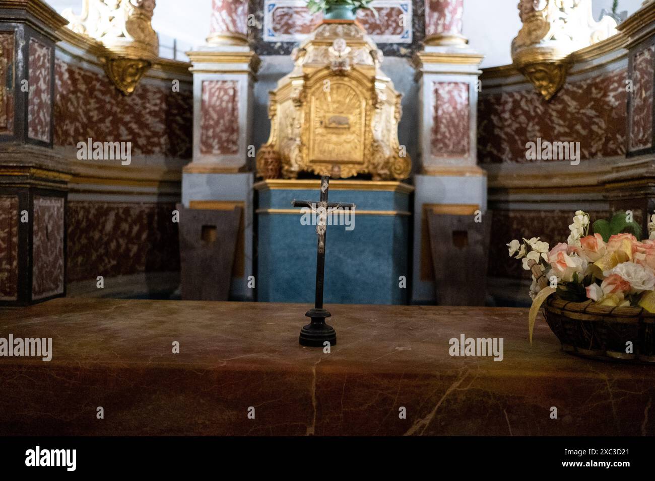 Crucifix with Jesus on the cross on the altar of the church of Santa ...