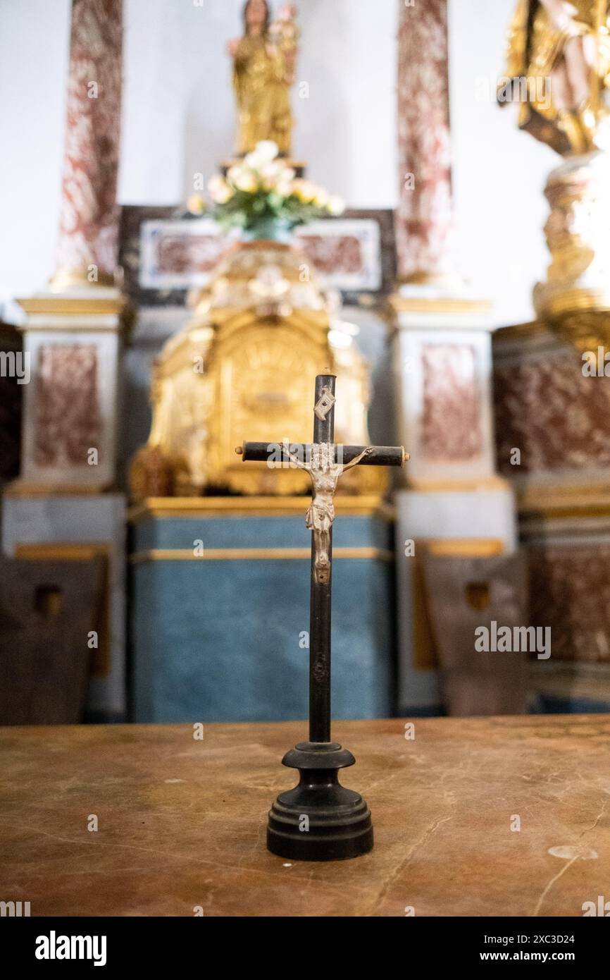 Crucifix with Jesus on the cross on the altar of the church of Santa ...