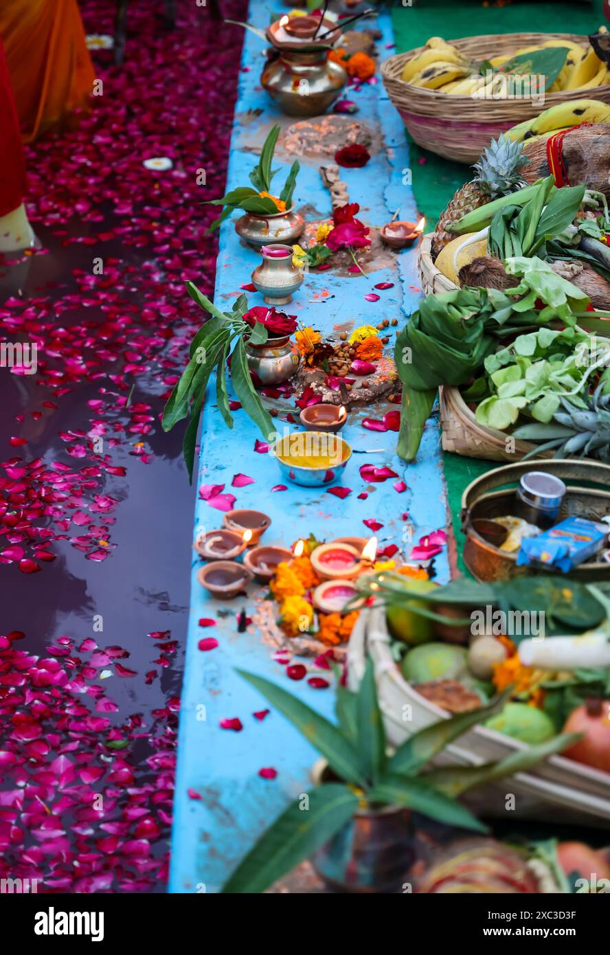 holy religious offerings with oil lamp and fruits for hindu sun god at ...