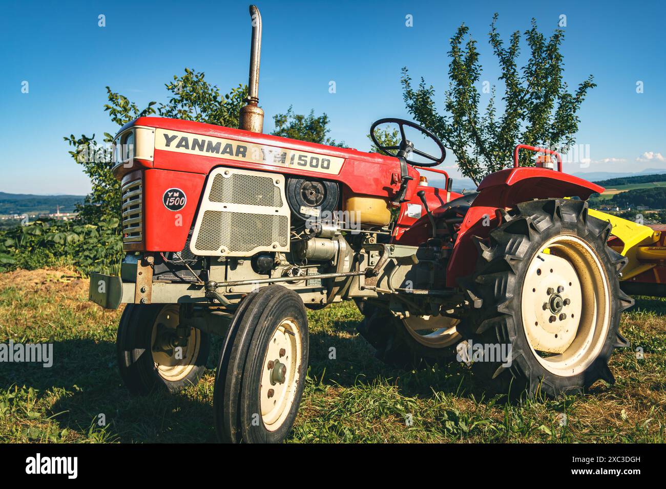 Yanmar YM 1500 japanese small tractor parking outside on a meadow Stock ...