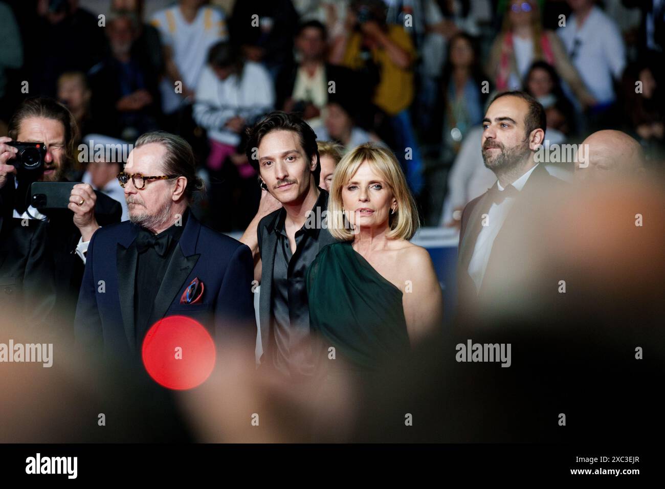 CANNES, FRANCE - MAY, 21: Gary Oldman, Celeste Dalla Porta, Dario Alita ...