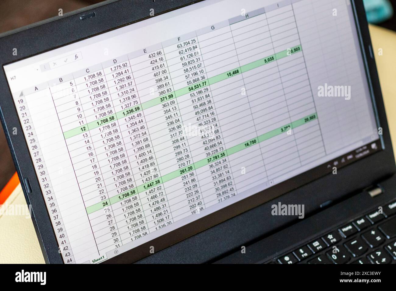 Shot of an excel sheet on computer screen showing bank loan ...