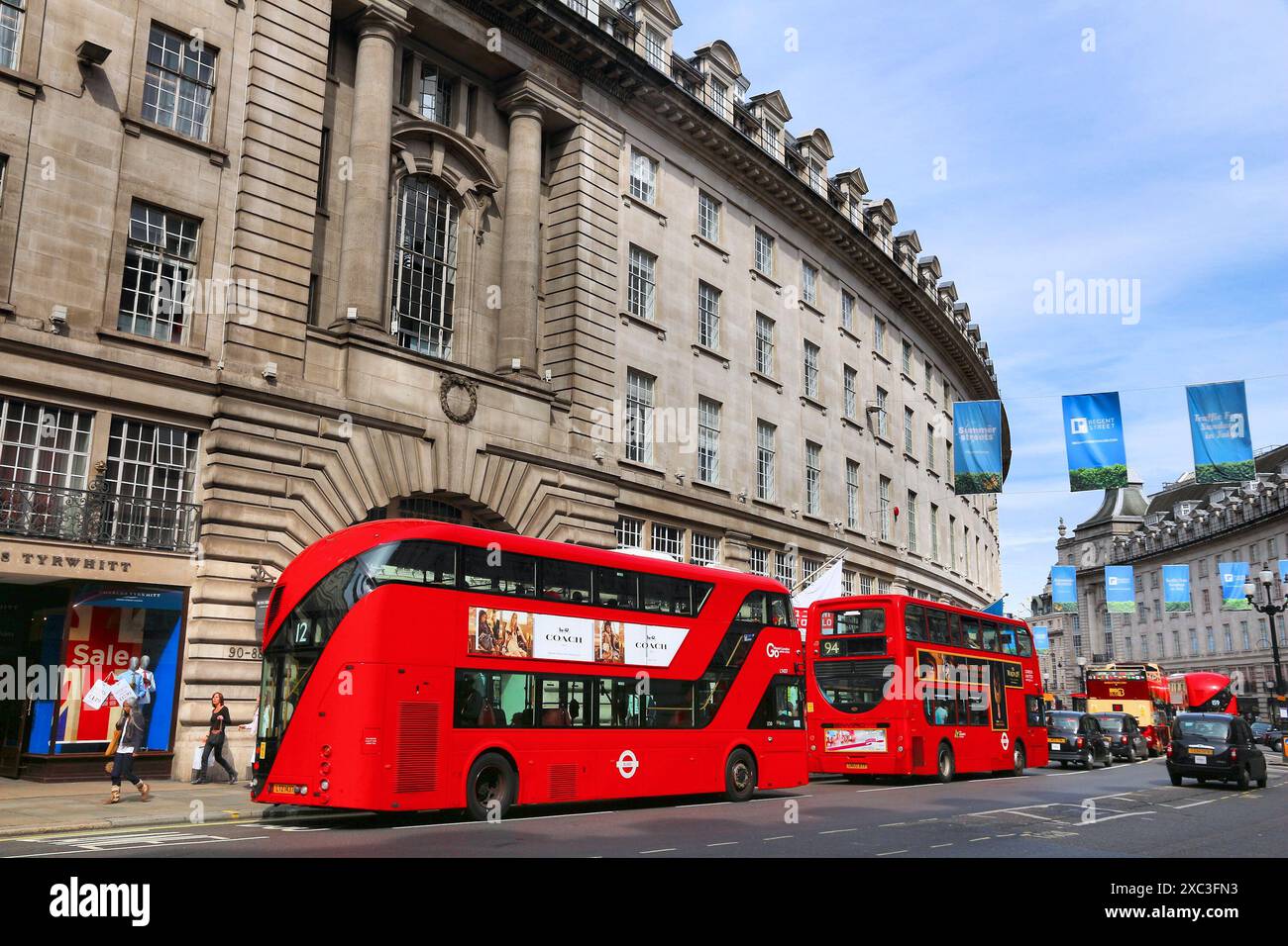 LONDON, UK - JULY 7, 2016: Red double decker buses at Regent Street in ...