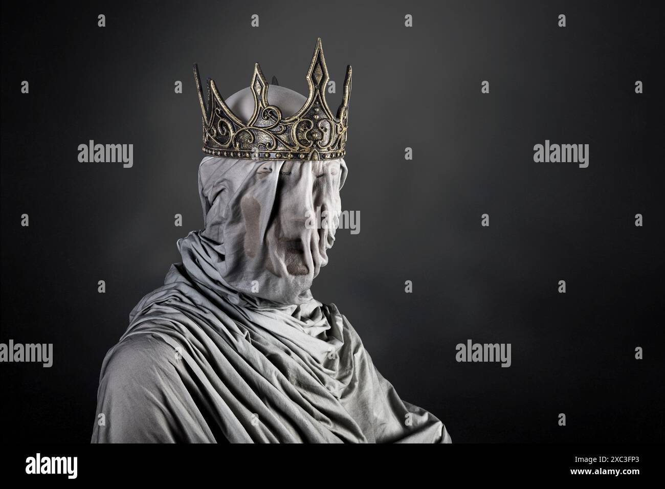 Ghost of a queen or king over dark misty background Stock Photo - Alamy