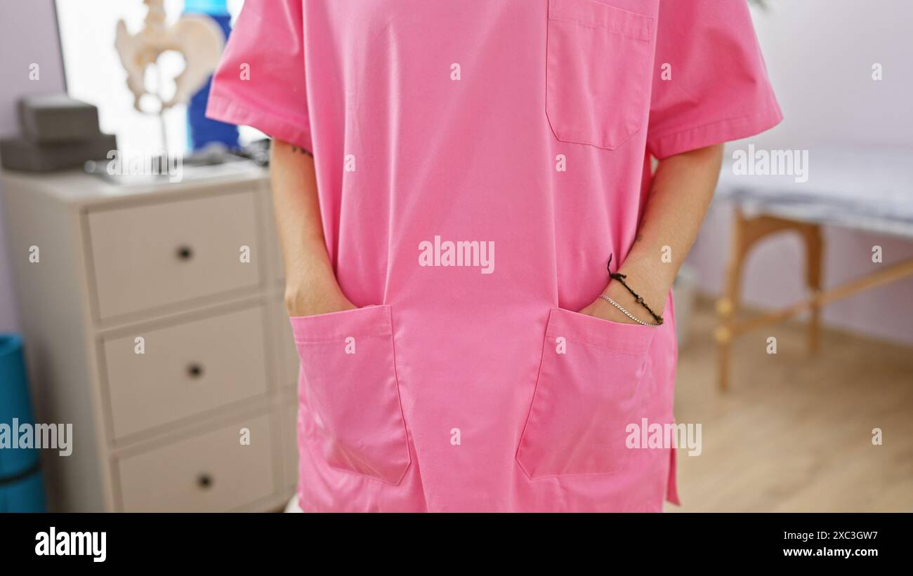 Female physician standing pink hi-res stock photography and images - Alamy