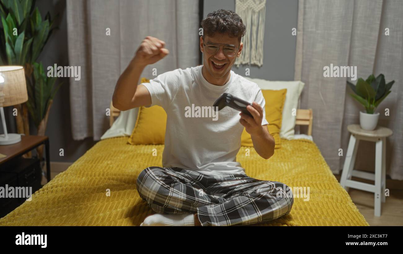Victorious gamer celebrating in hi-res stock photography and images - Alamy