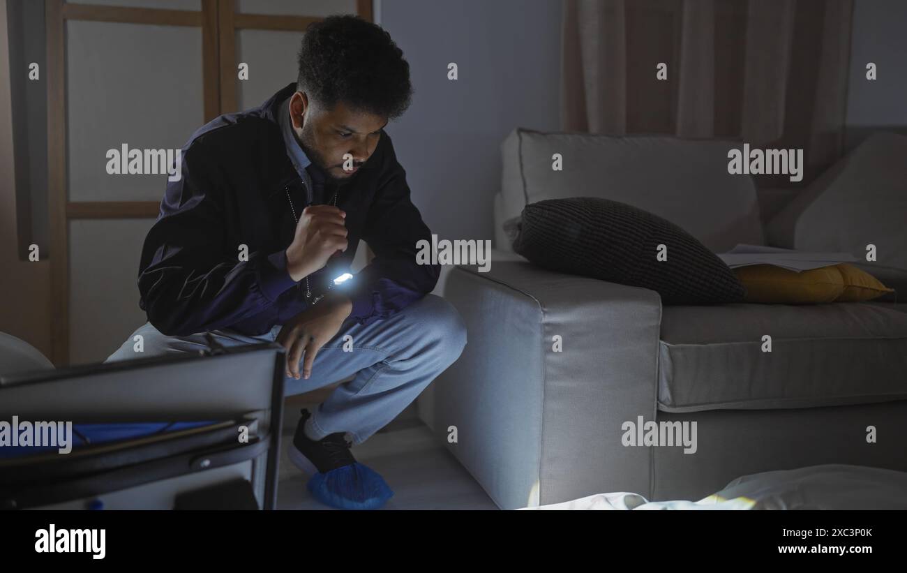 African american man in detective mode searching clues indoors with ...