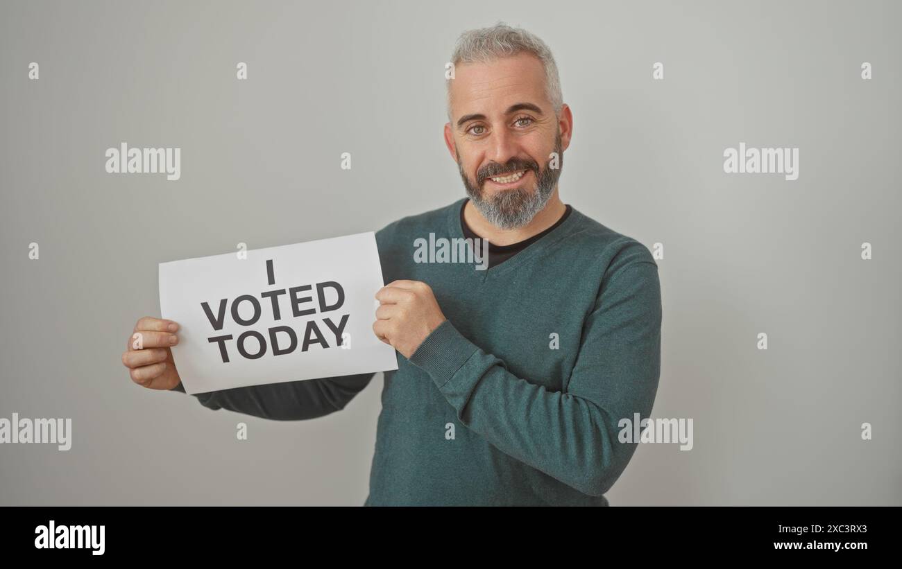 Bearded man holding a 'i voted today' sign against a white background ...