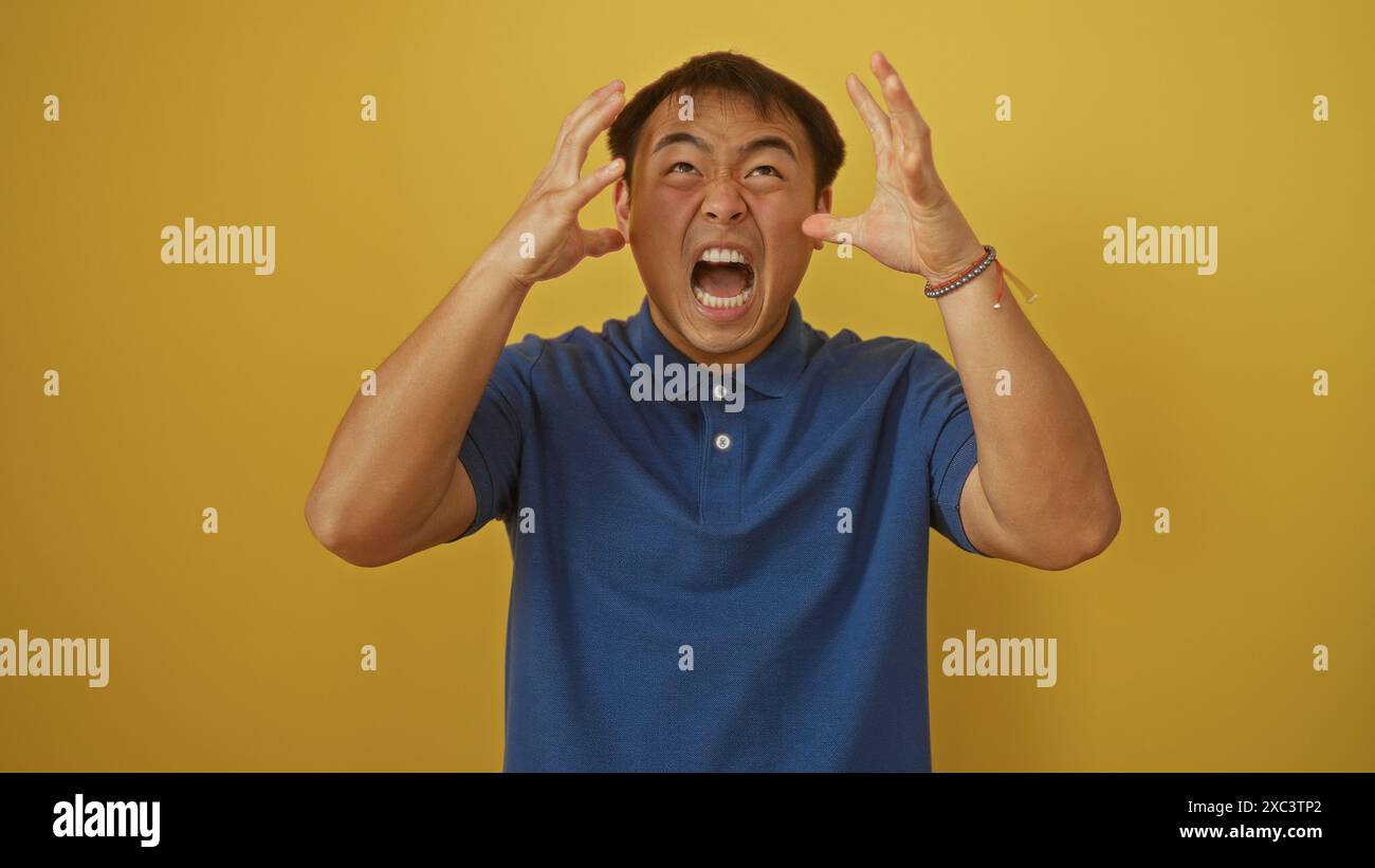 Angry yelling handsome man reacting hi-res stock photography and images ...