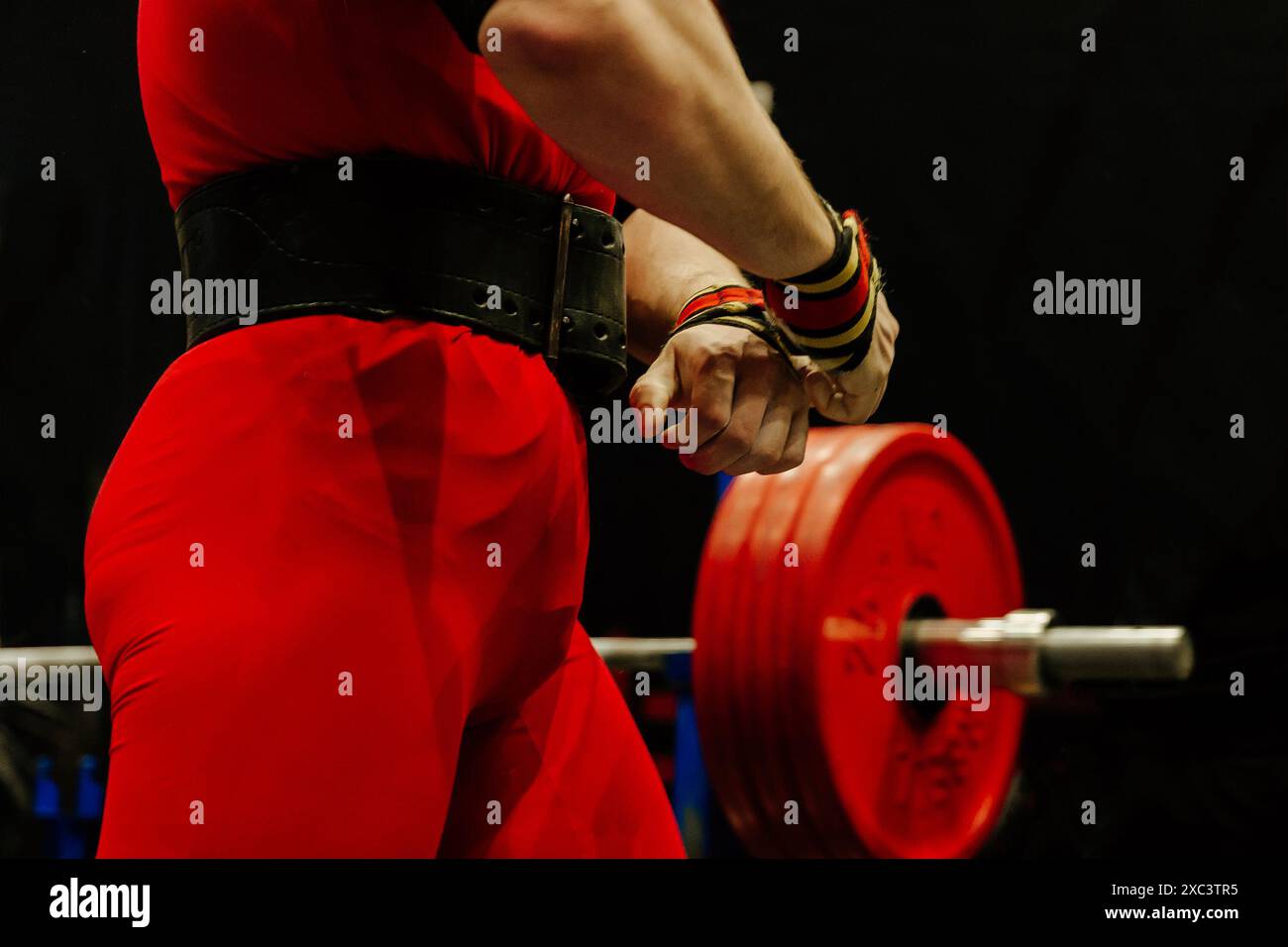 close-up athlete in red singlet on background bench press barbell Stock ...