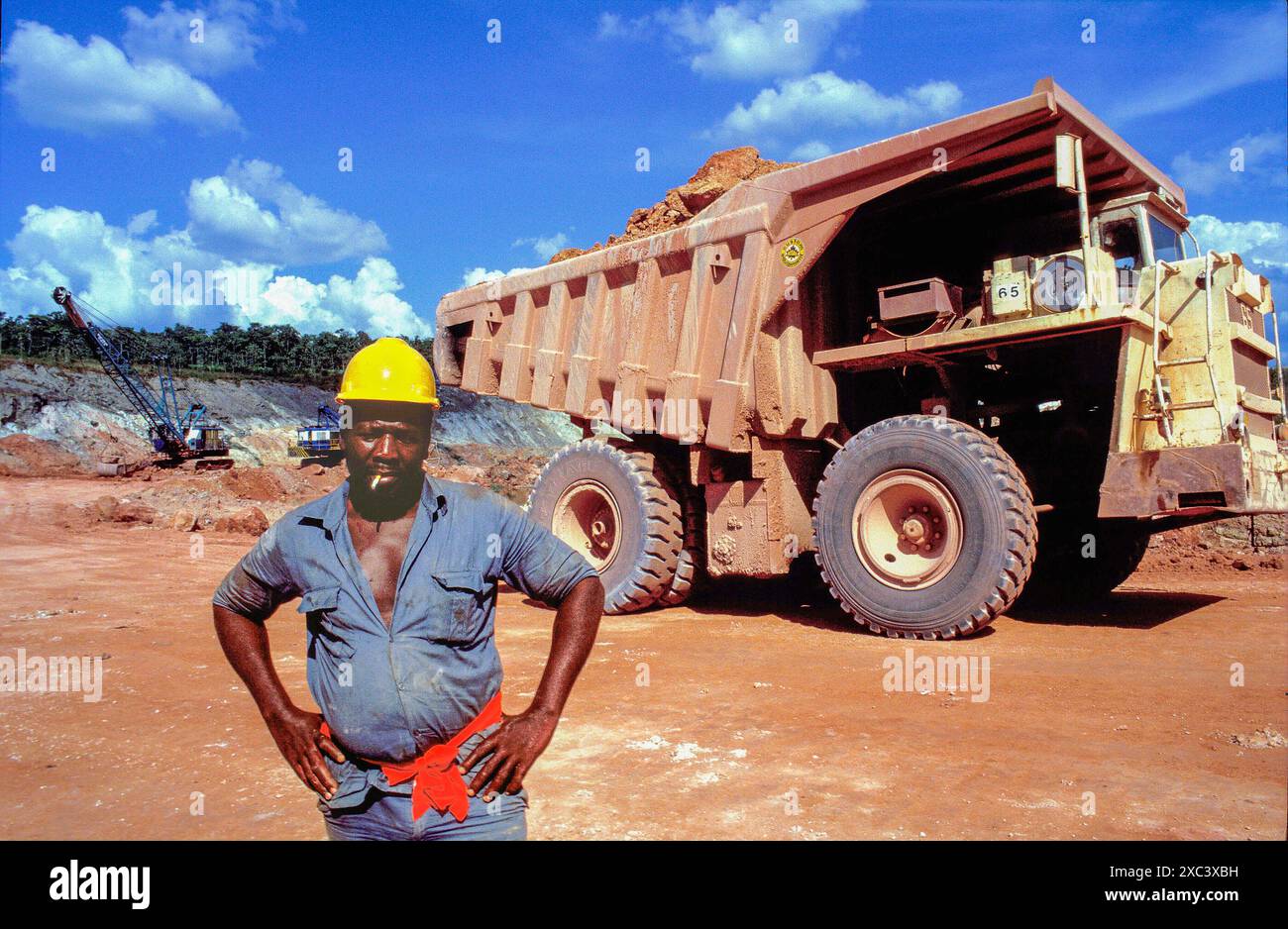 Suriname - Miner at bauxite mine Stock Photo - Alamy