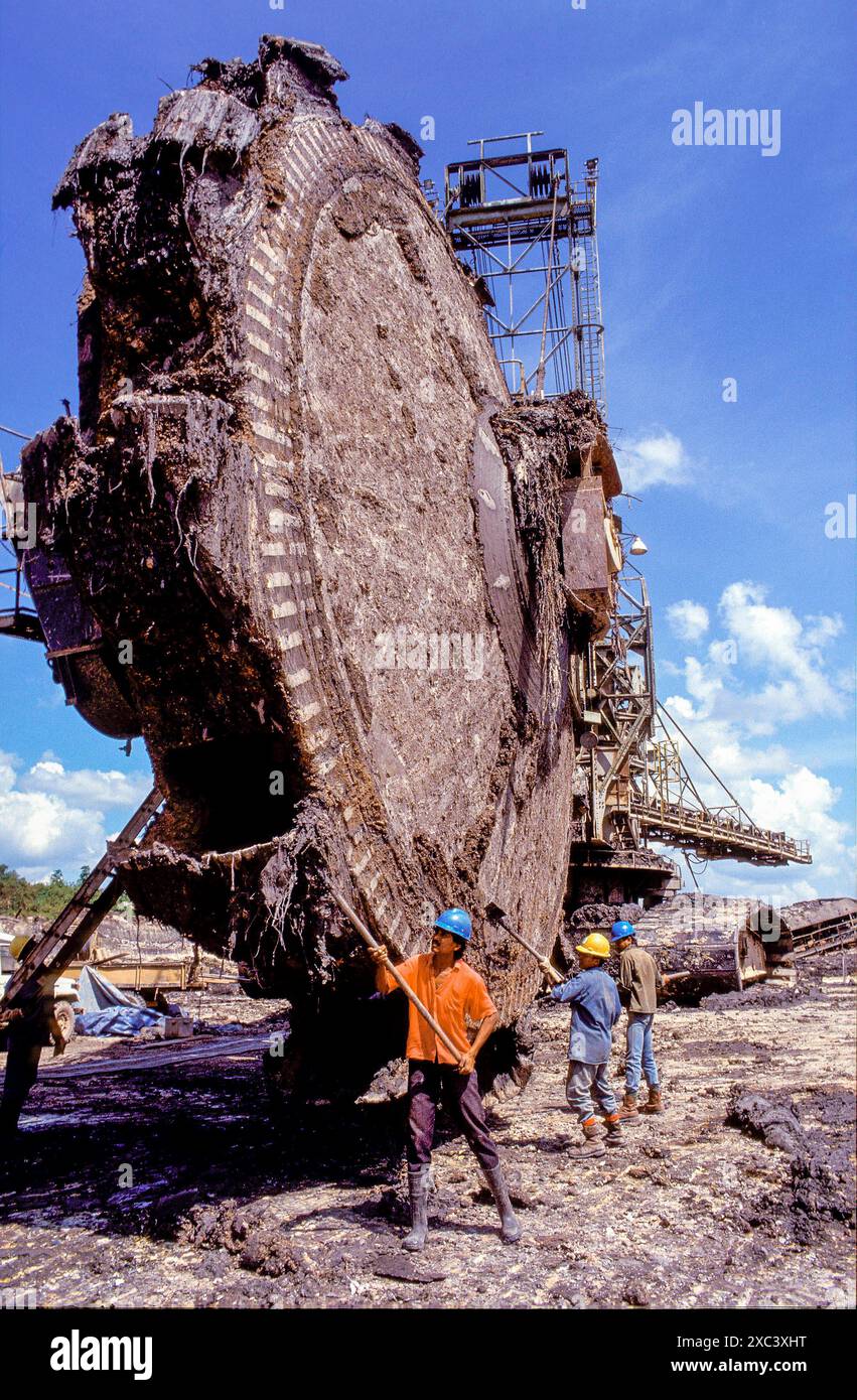Suriname, Maintenance of an excavator that mines the alum earth in open ...