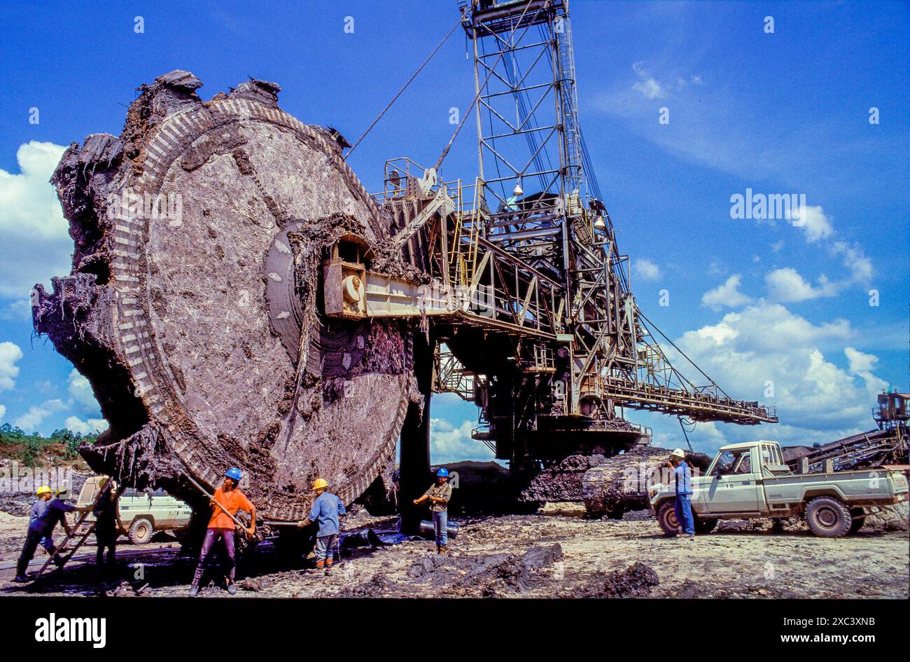 Suriname, Maintenance of an excavator that mines the alum earth in open ...