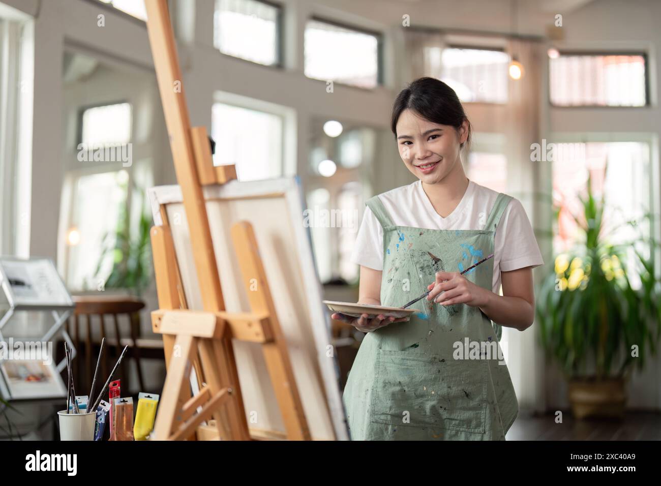 Talented Artist Painting in Bright Workshop. Creative Process in Modern ...