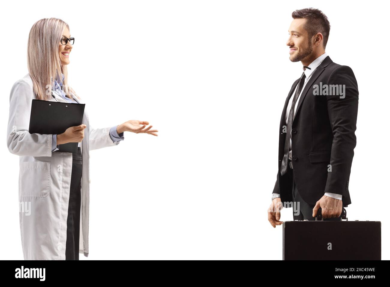 Female doctor having a conversation with a businessman isolated on ...