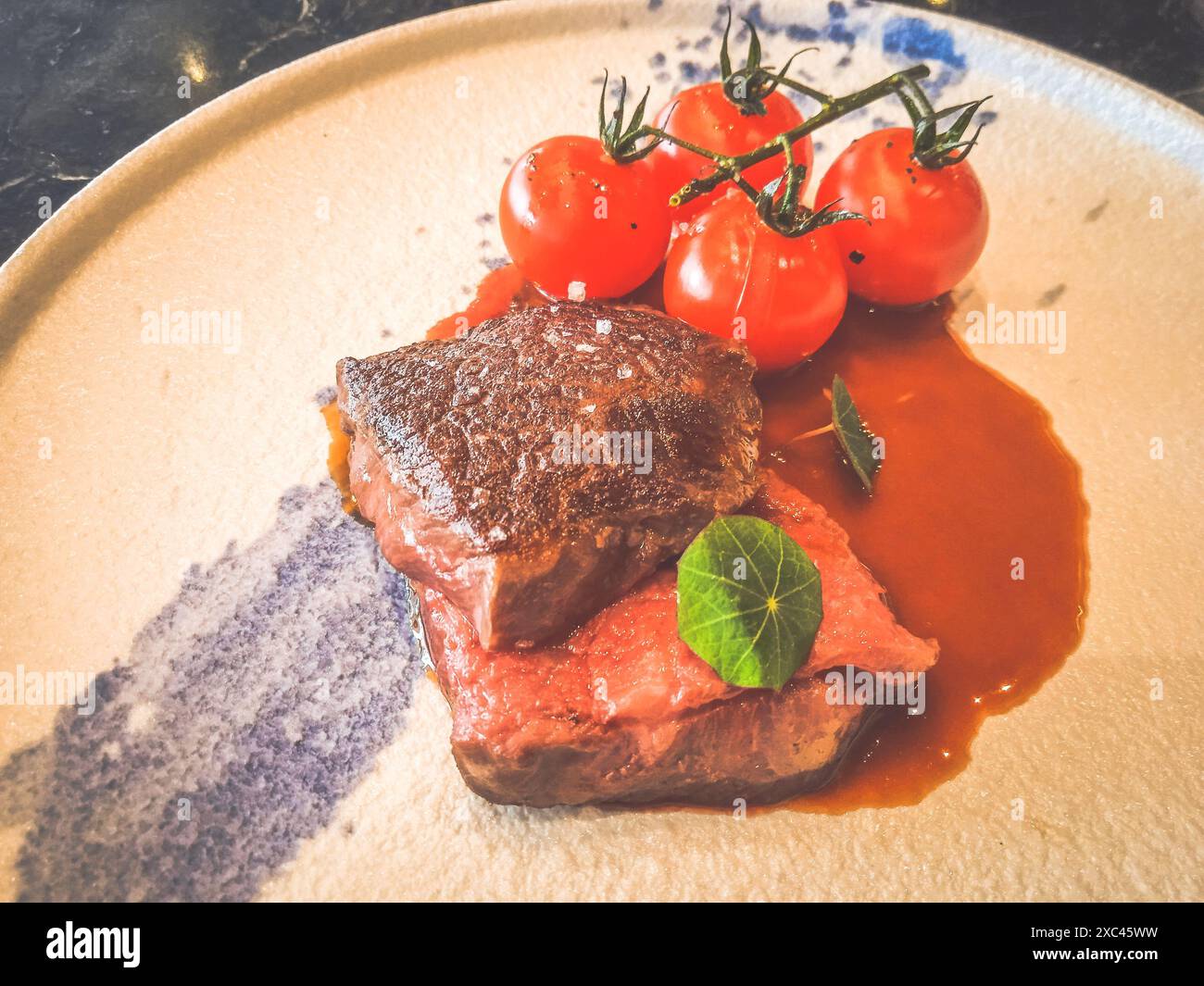 Wagyu Tri-tip made from 2GR Wagyu Tri-tip, red wine jus, baby tomatoes ...