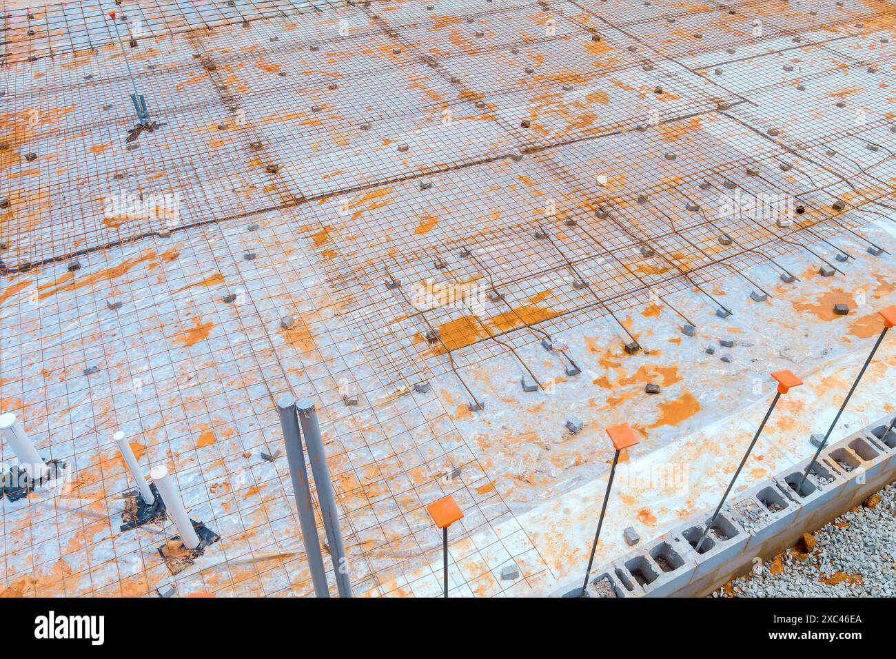 Concrete is ready to be poured over reinforcement metal framework to ...