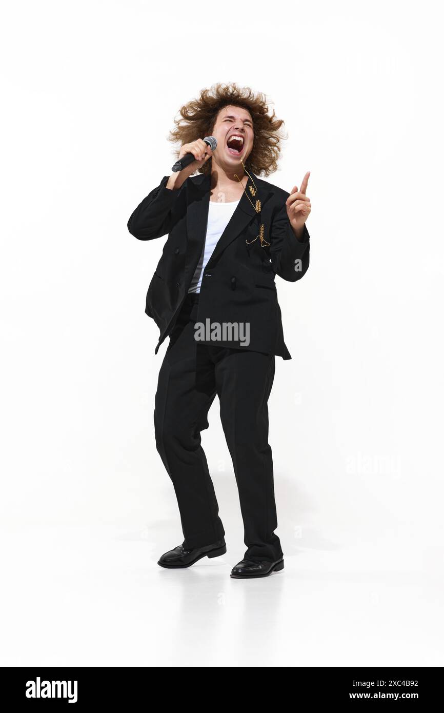 Live Performance. Full-length portrait of energetic and emotional man ...
