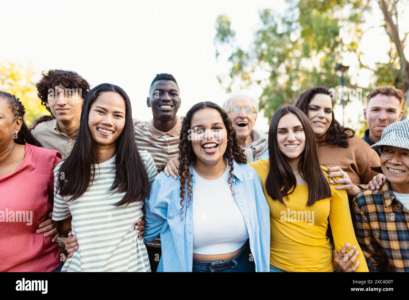 Happy multigenerational people with different ethnicities having fun ...