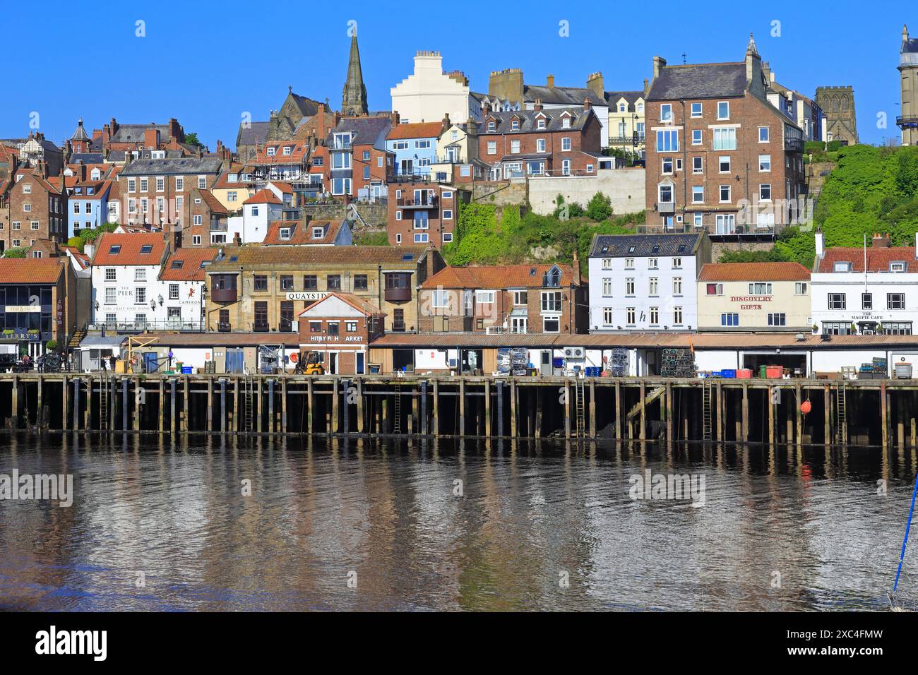 Outer harbour and old Fish Market, Whitby, North Yorkshire, England, UK ...