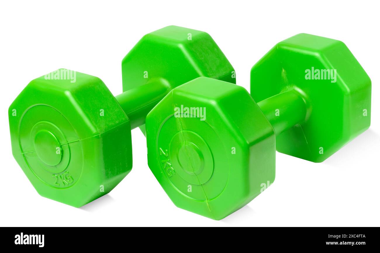 Green plastic dumbbell on a white isolated background, sports equipment ...