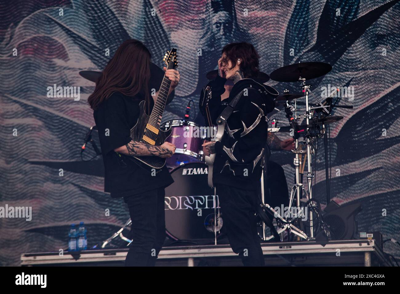 Donington, United Kingdom. 13th June 2024. Polyphia warm up the Main ...