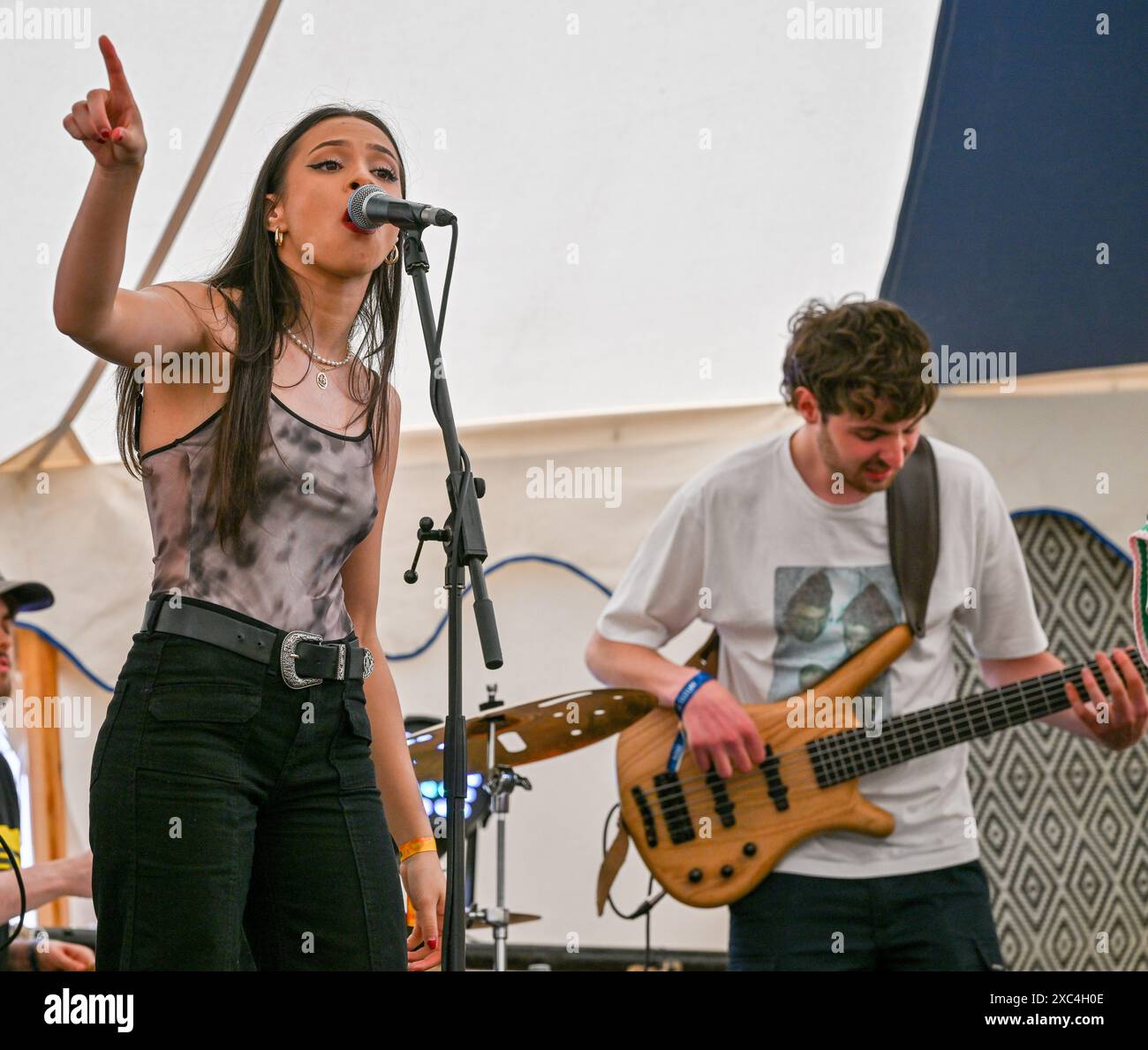 Eridge, UK. 14th June, 2024. Ruby J and her band play in the Cafe Nero ...