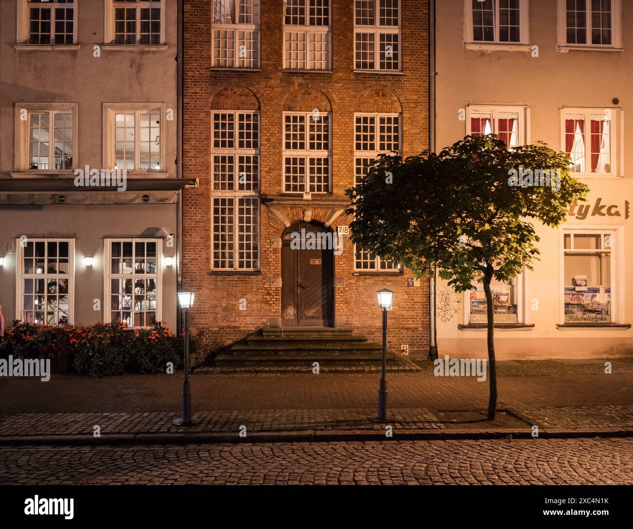 Gdanska starowka - old town at night. Front facades of buildings on ...