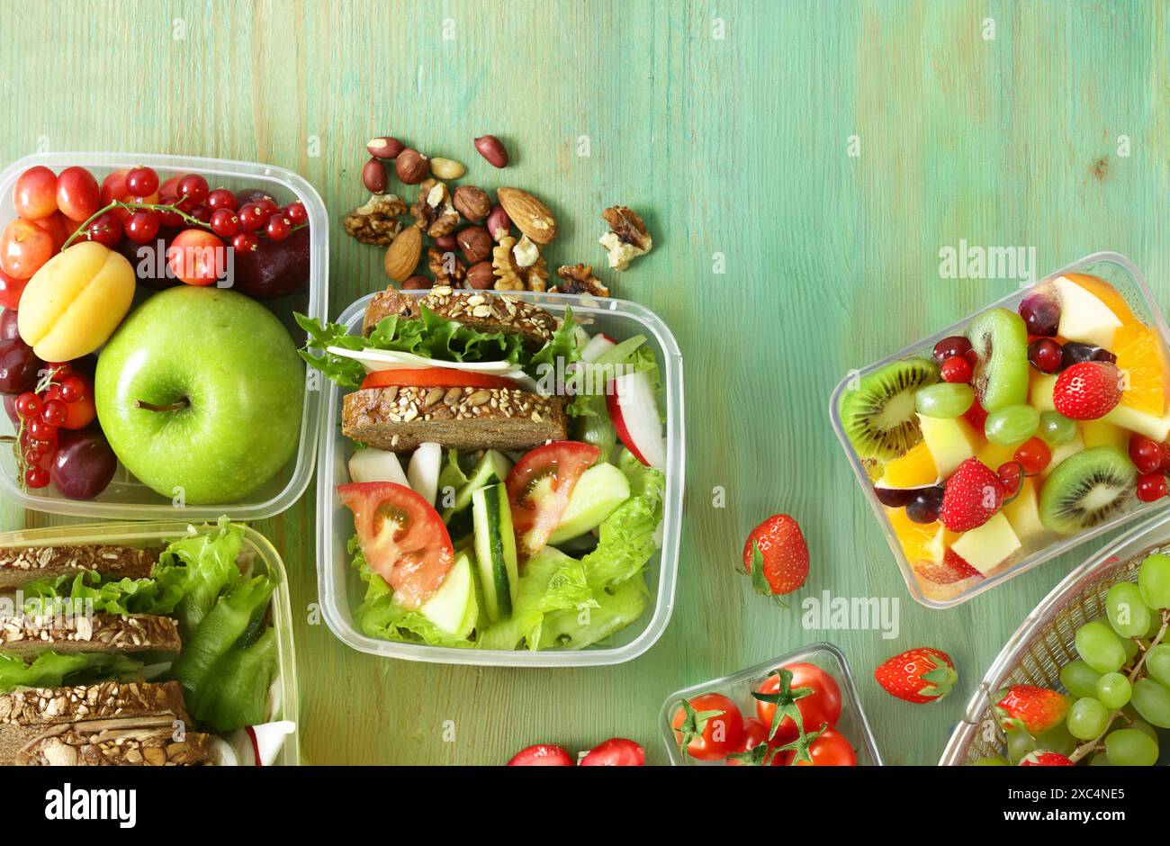 healthy food lunch boxes with vegetables and snacks Stock Photo - Alamy