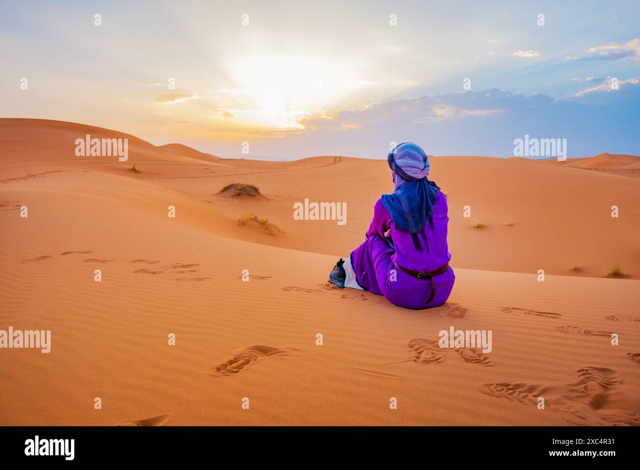 Sahara desert Sunset, tour in Merzouga Erg Chebbi dunes Stock Photo - Alamy