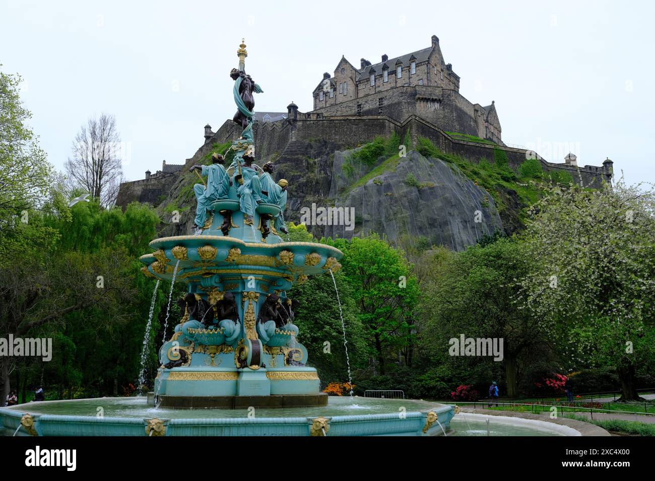 Ross fountain in Princes Street Garden with Edinburgh Castle in the ...